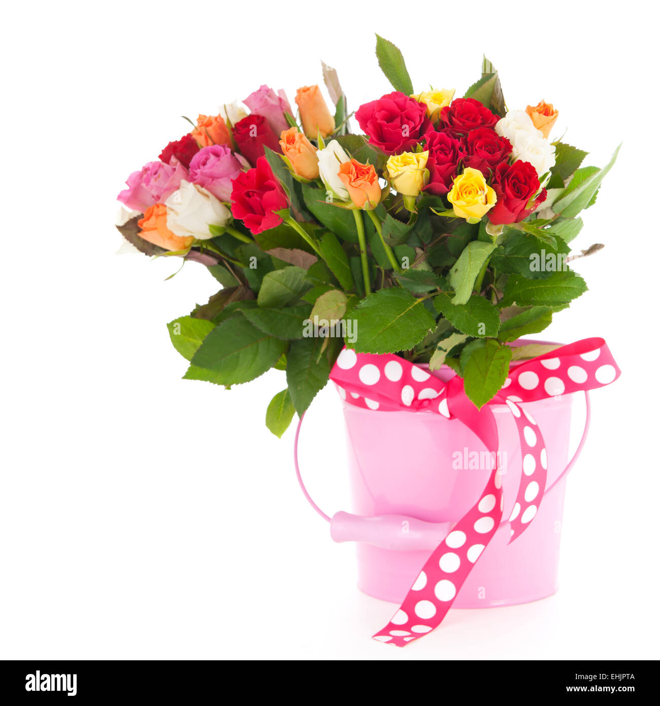 Bouquet colorful roses with ribbon in bucket isolated over white ...