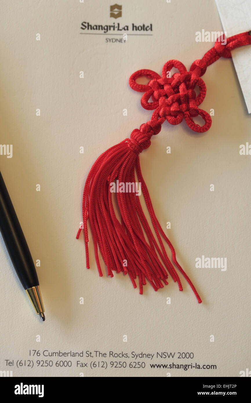 Shangri-La hotel note pad with a Chinese red silk knot in Hotel Shangri ...