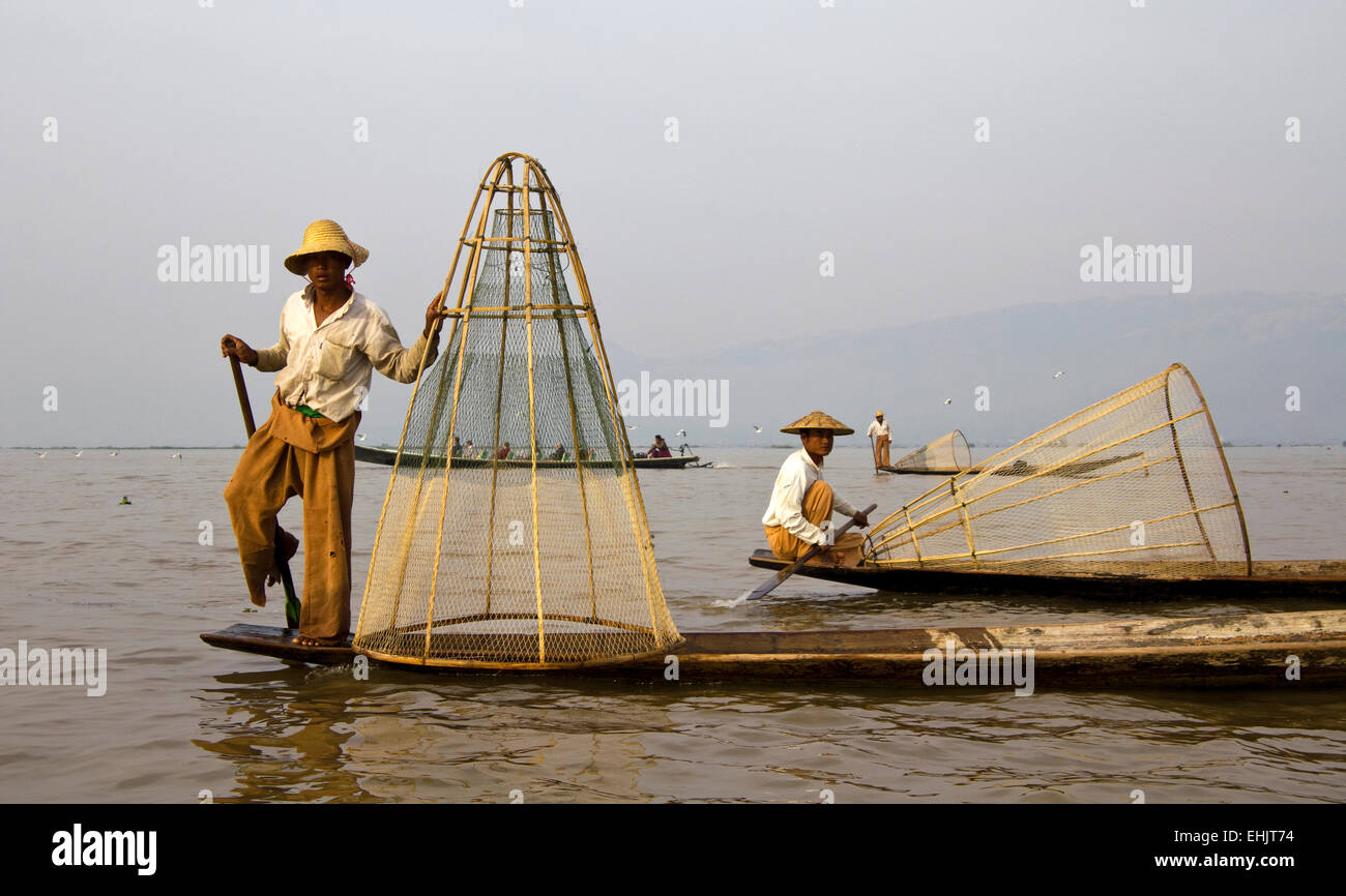Intha leg rowing fisherman Inle Lake Myanmar Stock Photo - Alamy