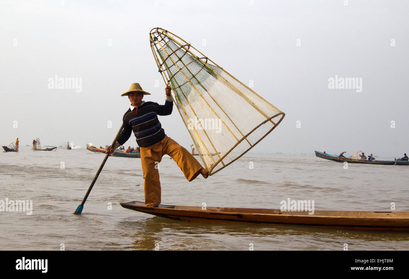 Intha leg rowing fisherman Inle Lake Myanmar Stock Photo - Alamy