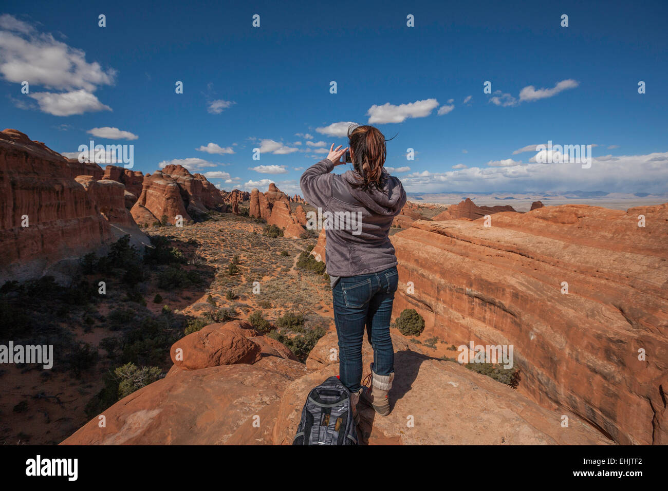 Female adventurer exploring the desert Stock Photo - Alamy