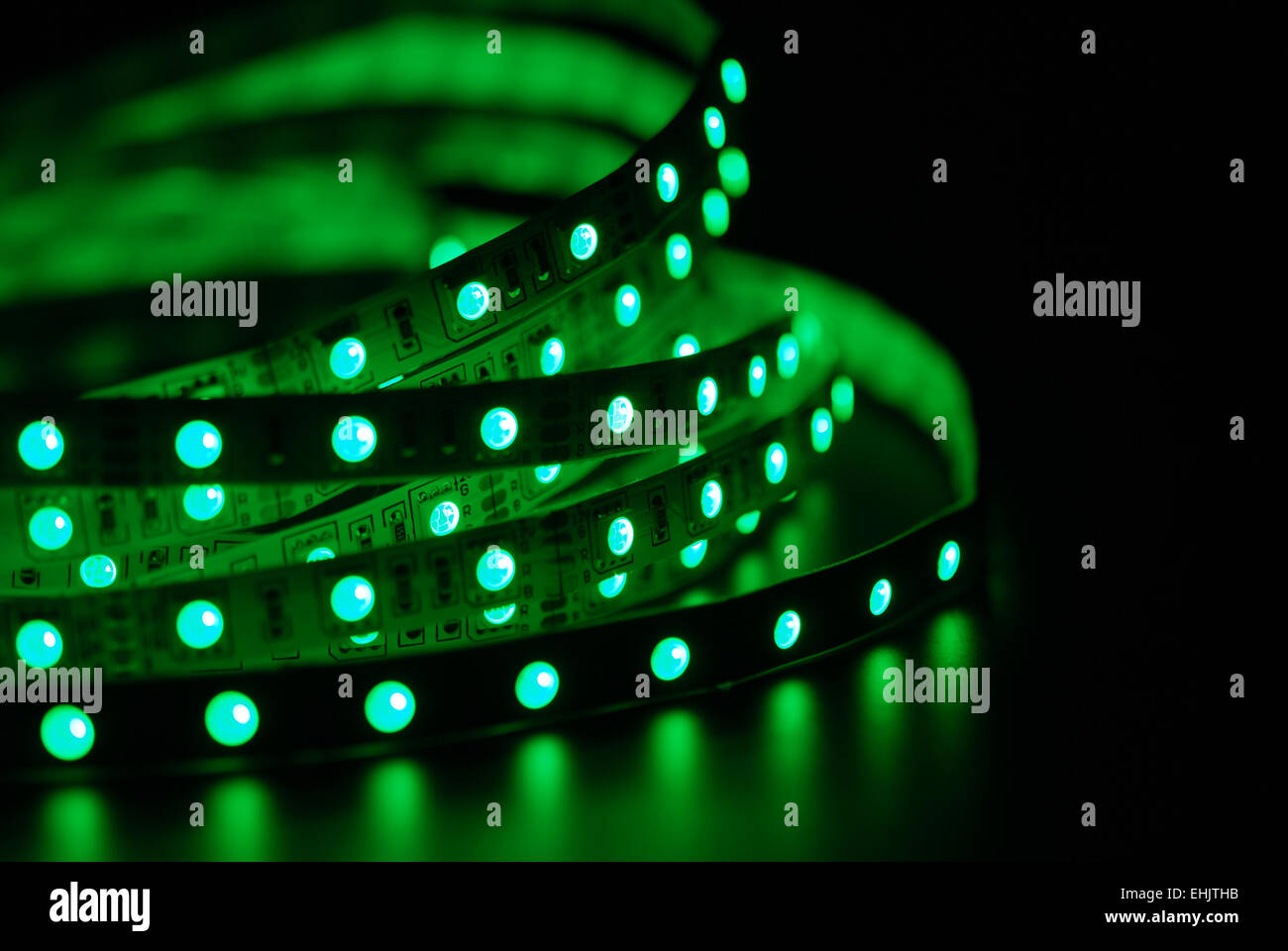 green led stripe on the black background Stock Photo - Alamy