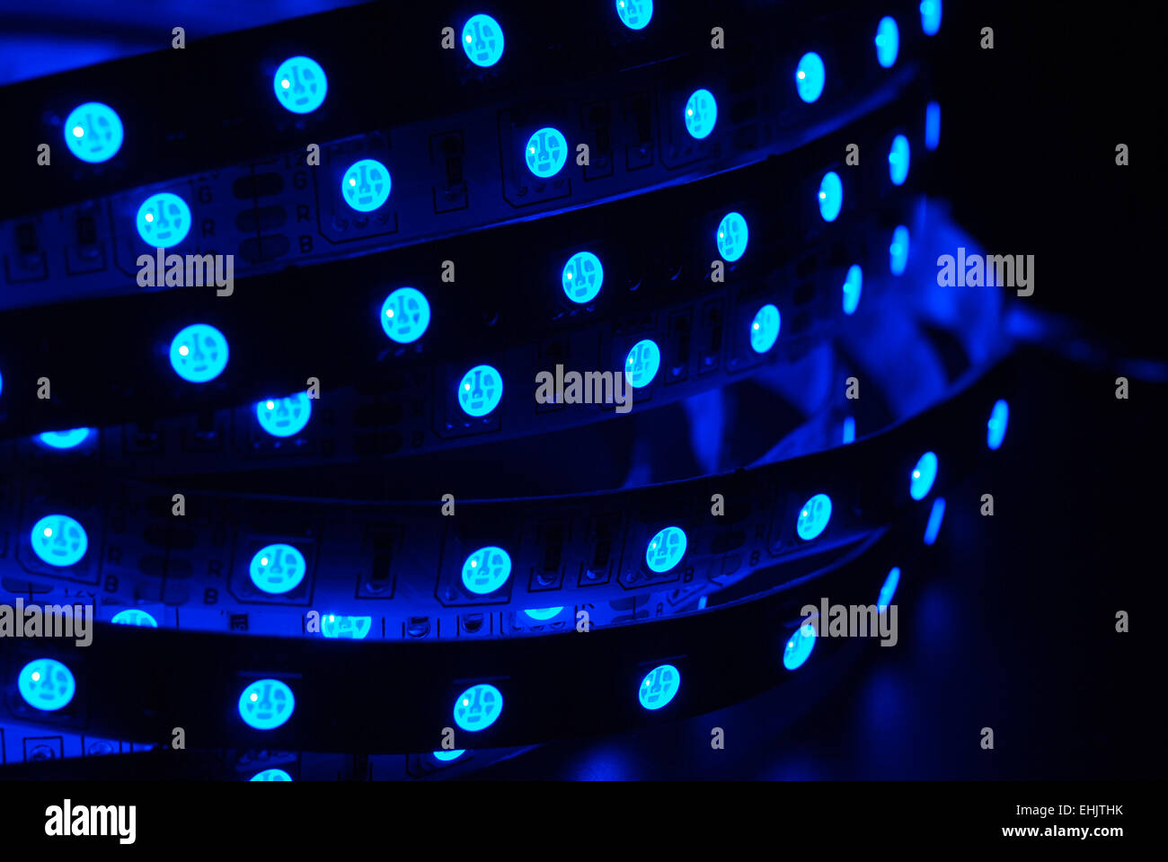 Blue Led stripe on the black background Stock Photo - Alamy