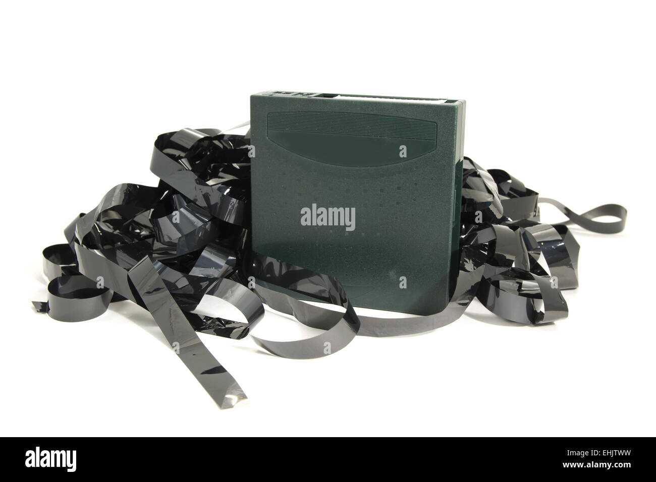 Tangled magnetic tape on white background Stock Photo - Alamy
