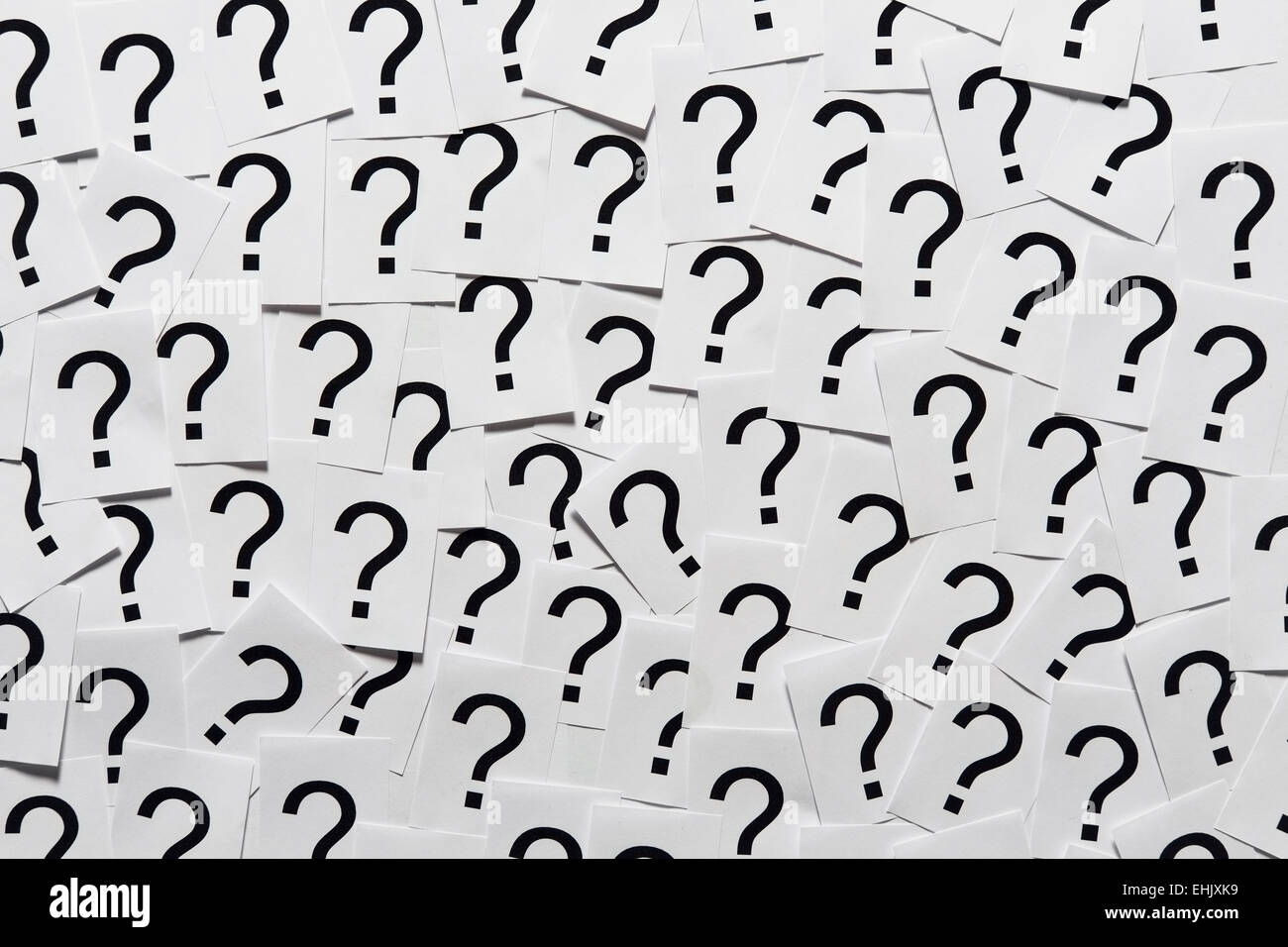 Many question marks on paper. Question concept Stock Photo - Alamy