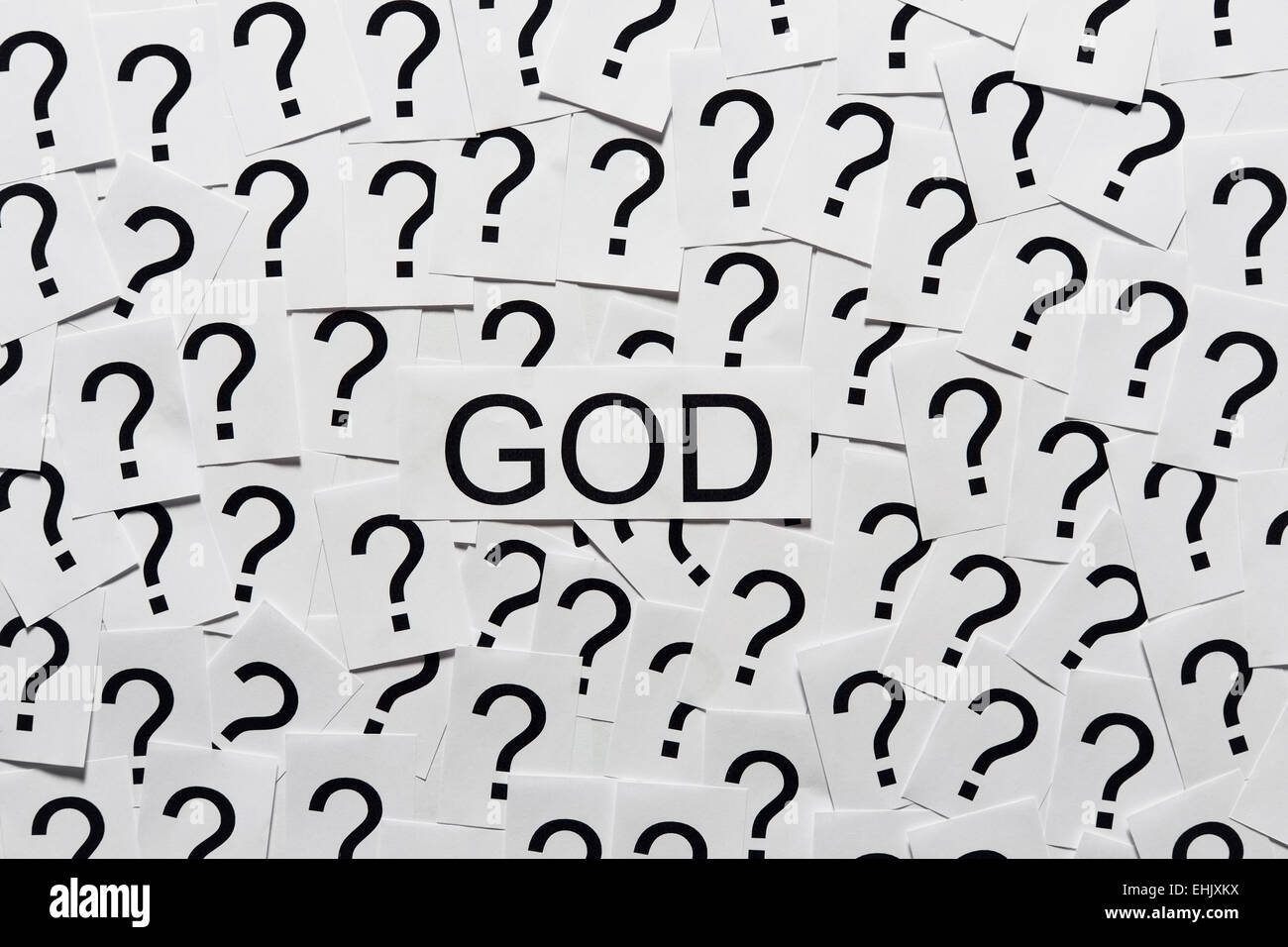 Where is God? Belief? Many question marks on paper. Question concept ...