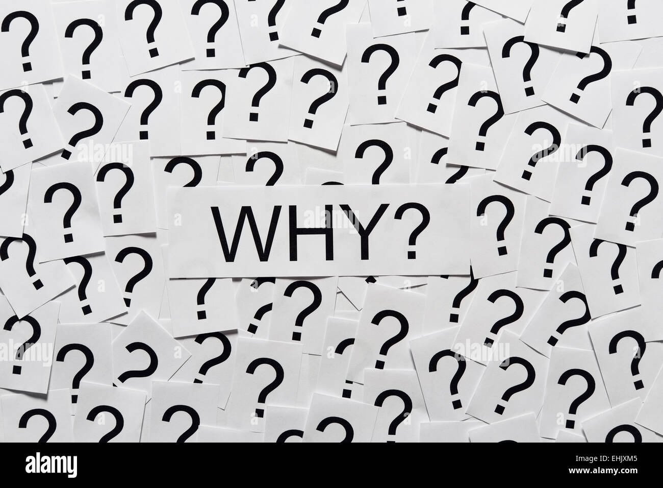 Why and many question marks on paper. Question concept Stock Photo - Alamy