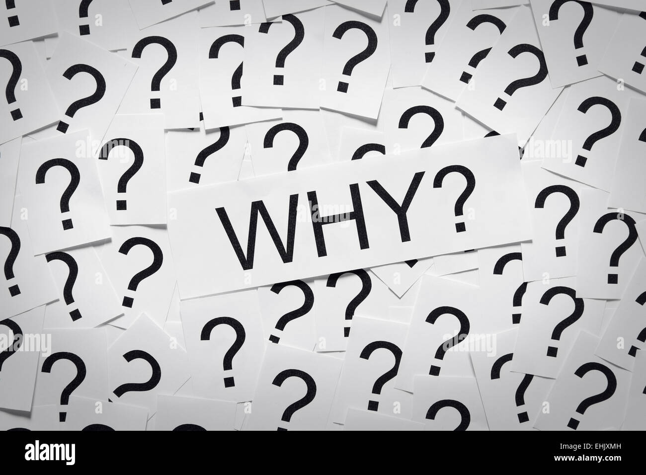 Why and many question marks on paper. Question concept Stock Photo - Alamy