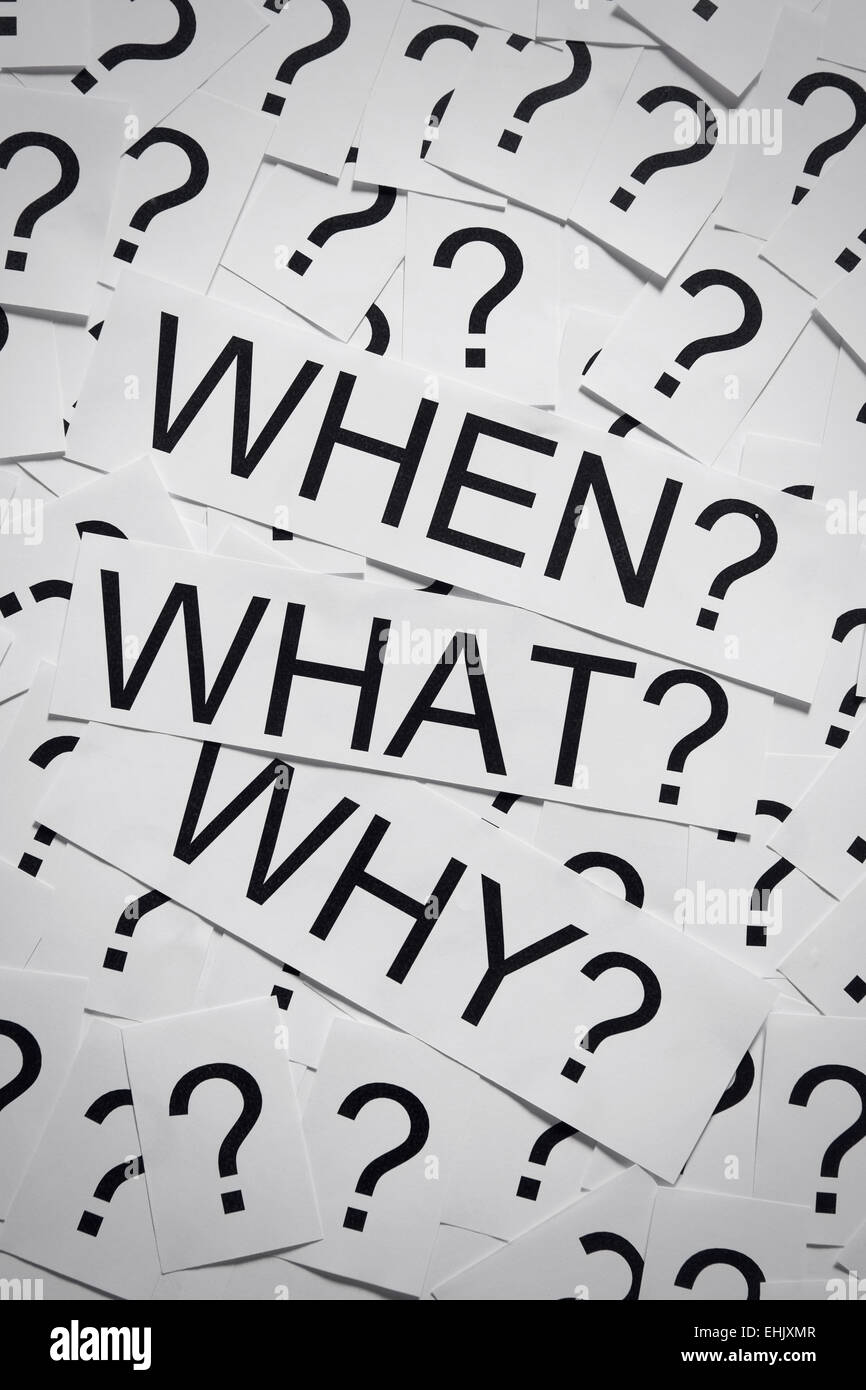 Why, when and why on many question marks on paper. Question concept ...