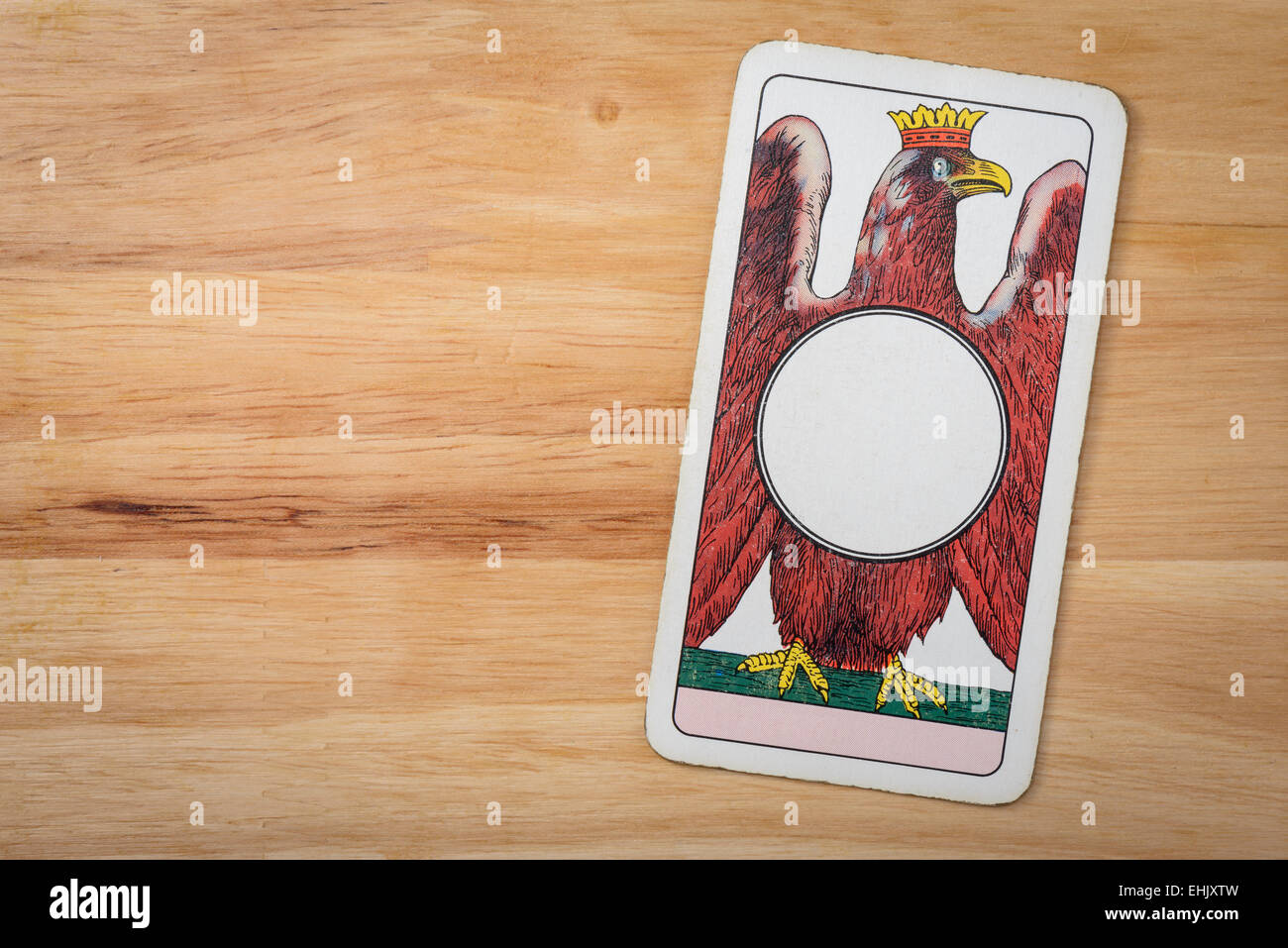 Dinar ace italian card on a wood background Stock Photo - Alamy