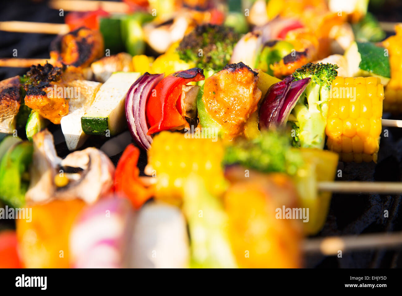 Fresh and delicious barbecue with skewers with vegetables Stock Photo ...