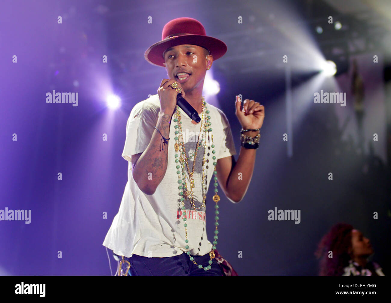 Pharrell Williams performing at Manchester Phones4U Arena Featuring ...