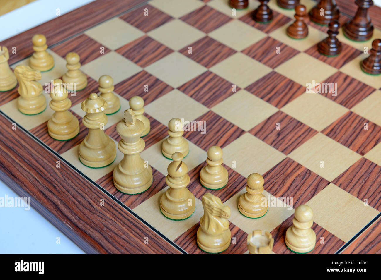 Wooden Chess pieces on board Stock Photo - Alamy
