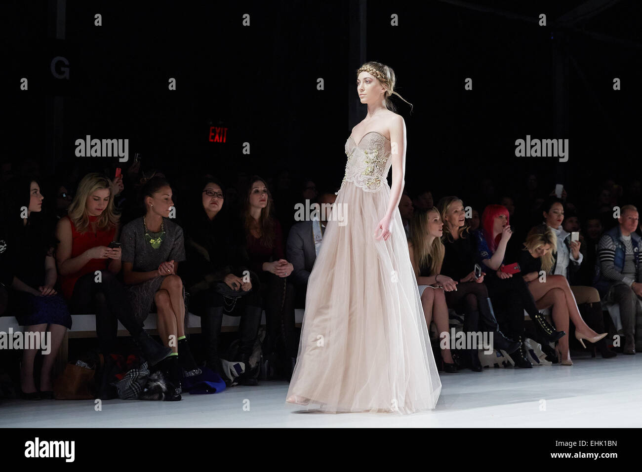 A model walks runway at the New York Life fashion show during MBFW Fall ...