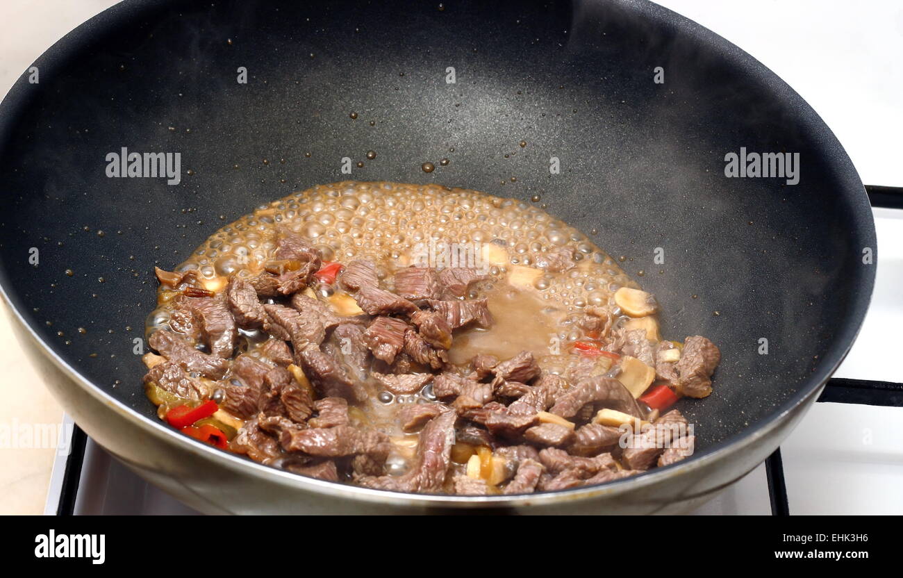 Red fryingpan hi-res stock photography and images - Alamy