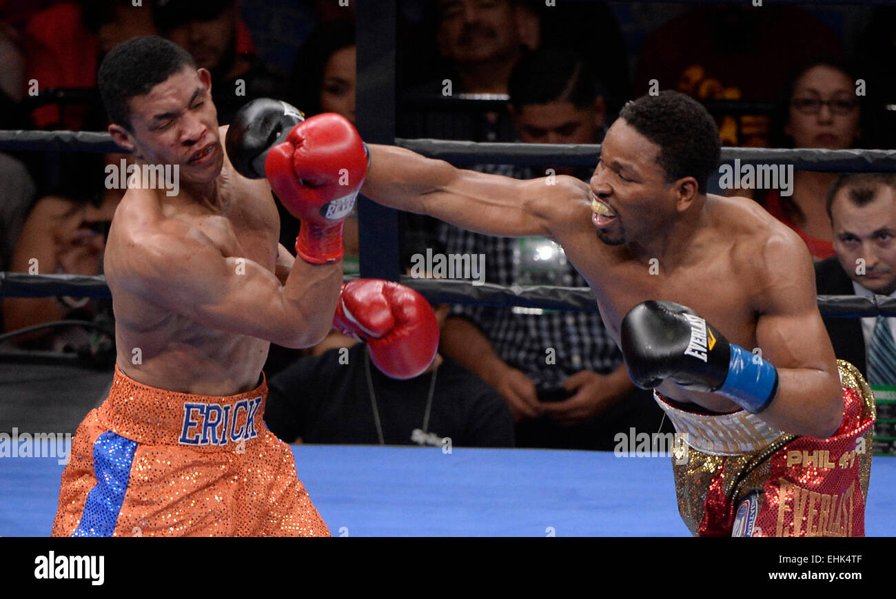 Ontario CA. 13th Mar, 2015. (in gold-red tks) Shawn Porter goes 5 ...