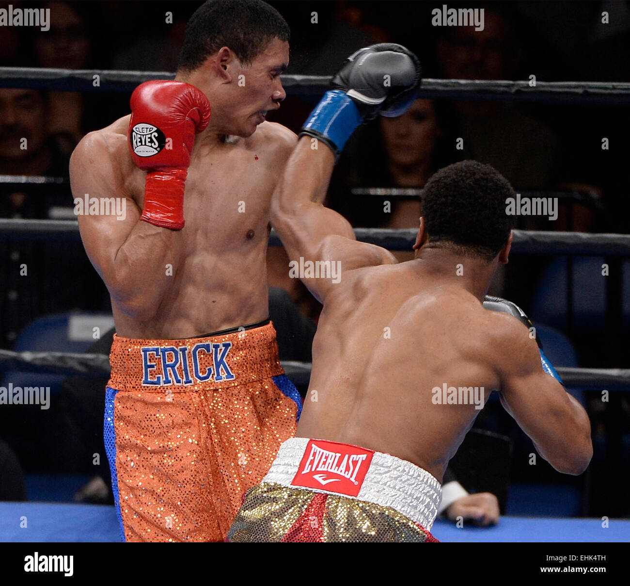 Ontario CA. 13th Mar, 2015. (in gold-red tks) Shawn Porter goes 5 ...