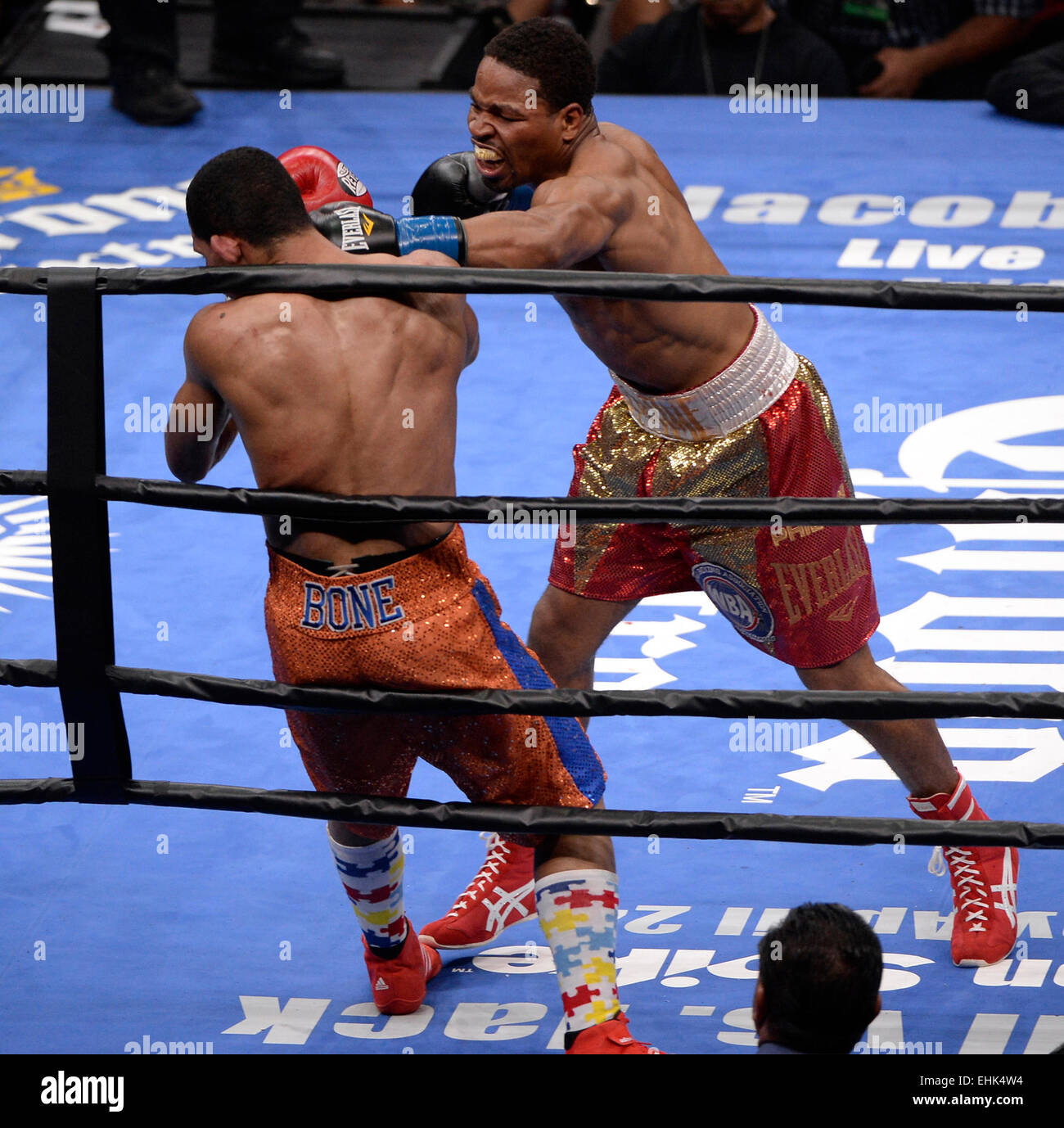 Ontario CA. 13th Mar, 2015. (in gold-red tks) Shawn Porter goes 5 ...