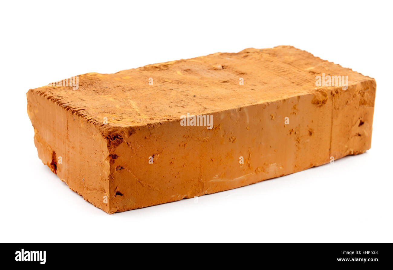 red solid brick on a white background Stock Photo - Alamy