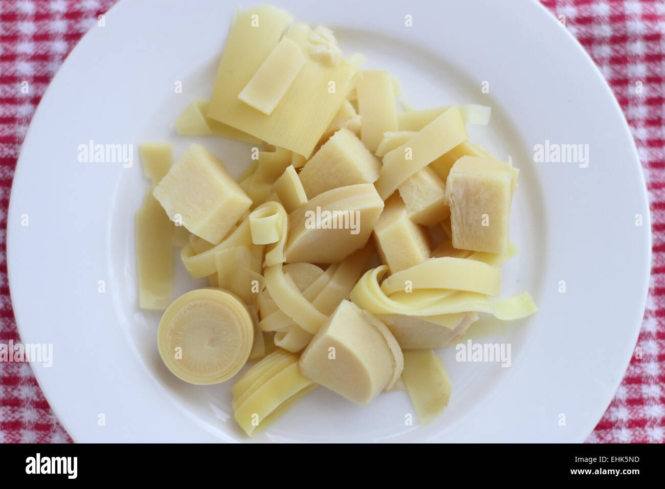 Boiled bamboo shoots on a white plate Stock Photo - Alamy
