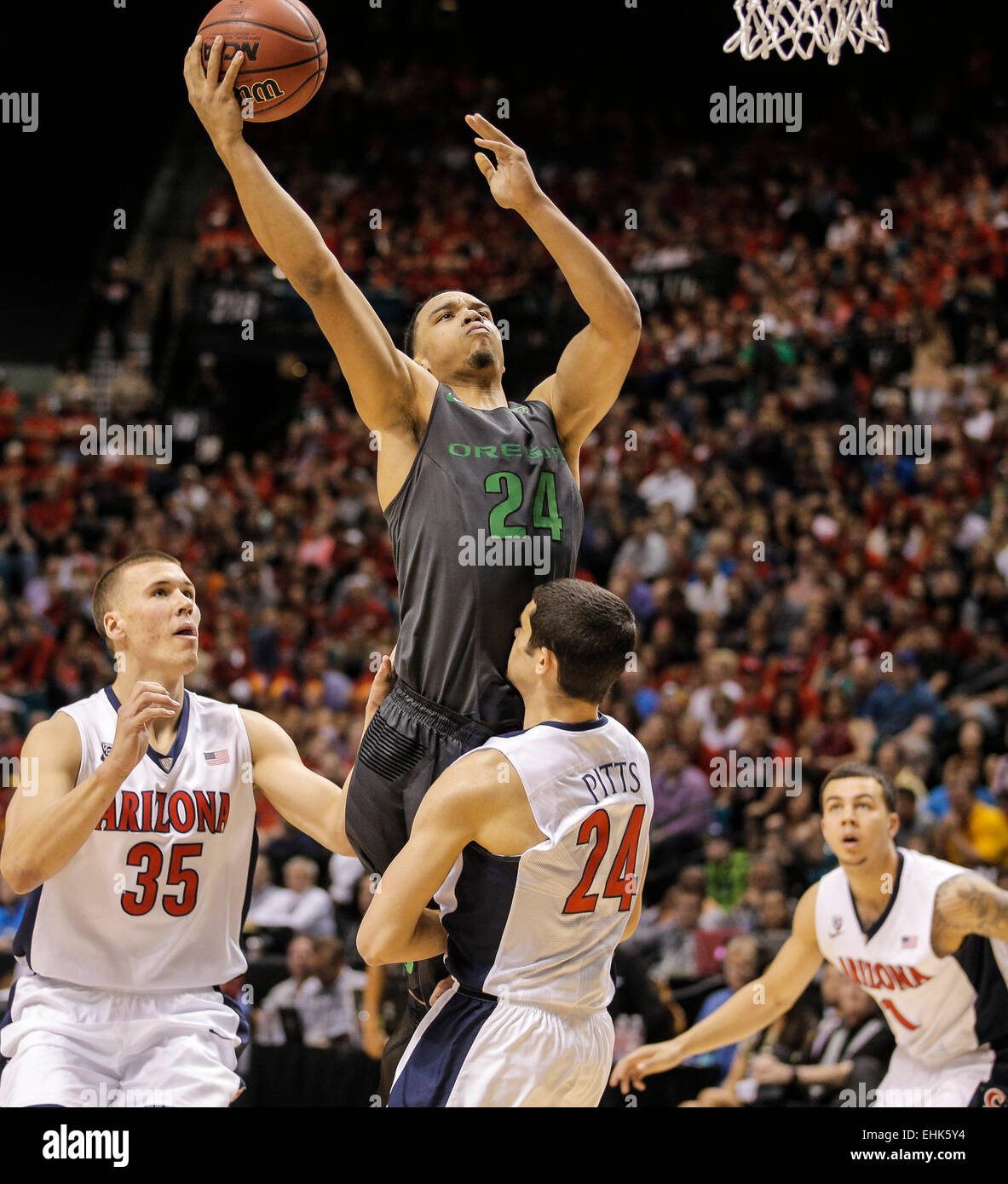 Las Vegas, NV, USA. 14th Mar, 2015. Oregon F # 24 Dillon Cook tries to ...