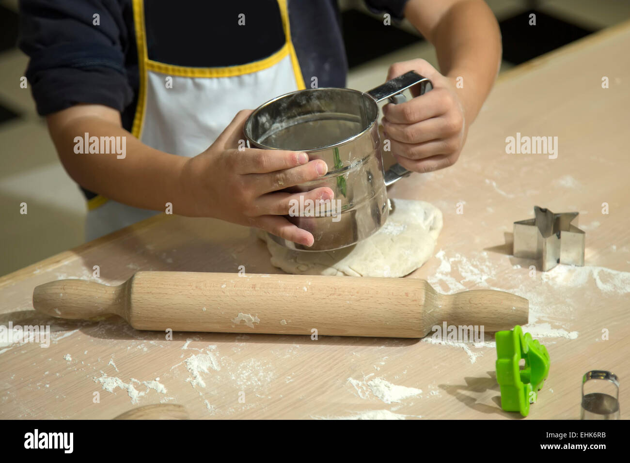 Boy making cakes in the kichen Stock Photo - Alamy