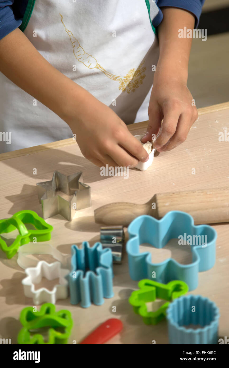 Boy making cakes in the kichen Stock Photo - Alamy