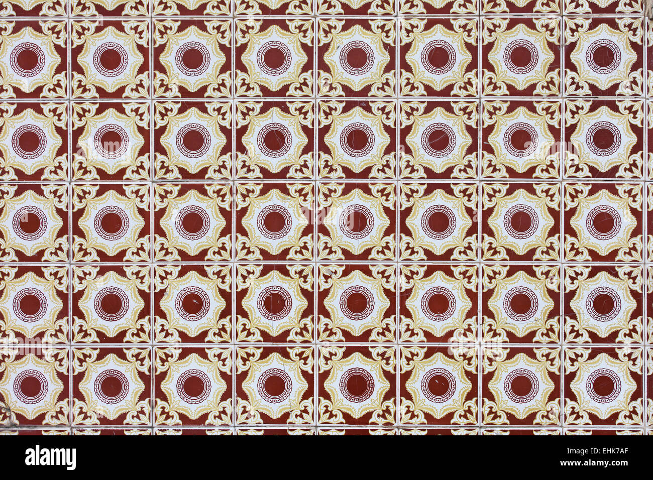 Patterned wall tiles background on an old house facade in Porto ...