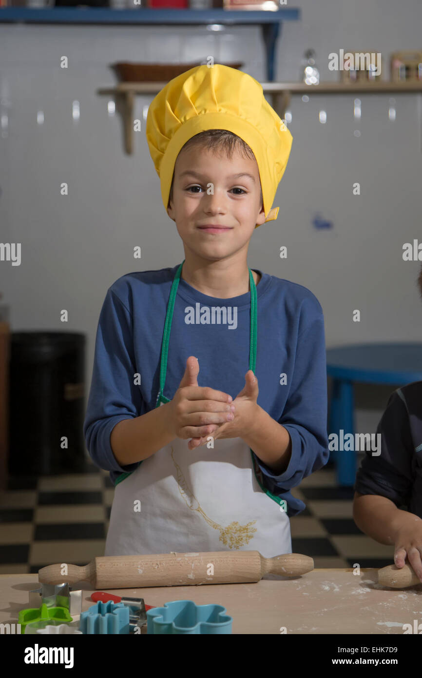 Boy making cakes in the kichen Stock Photo - Alamy