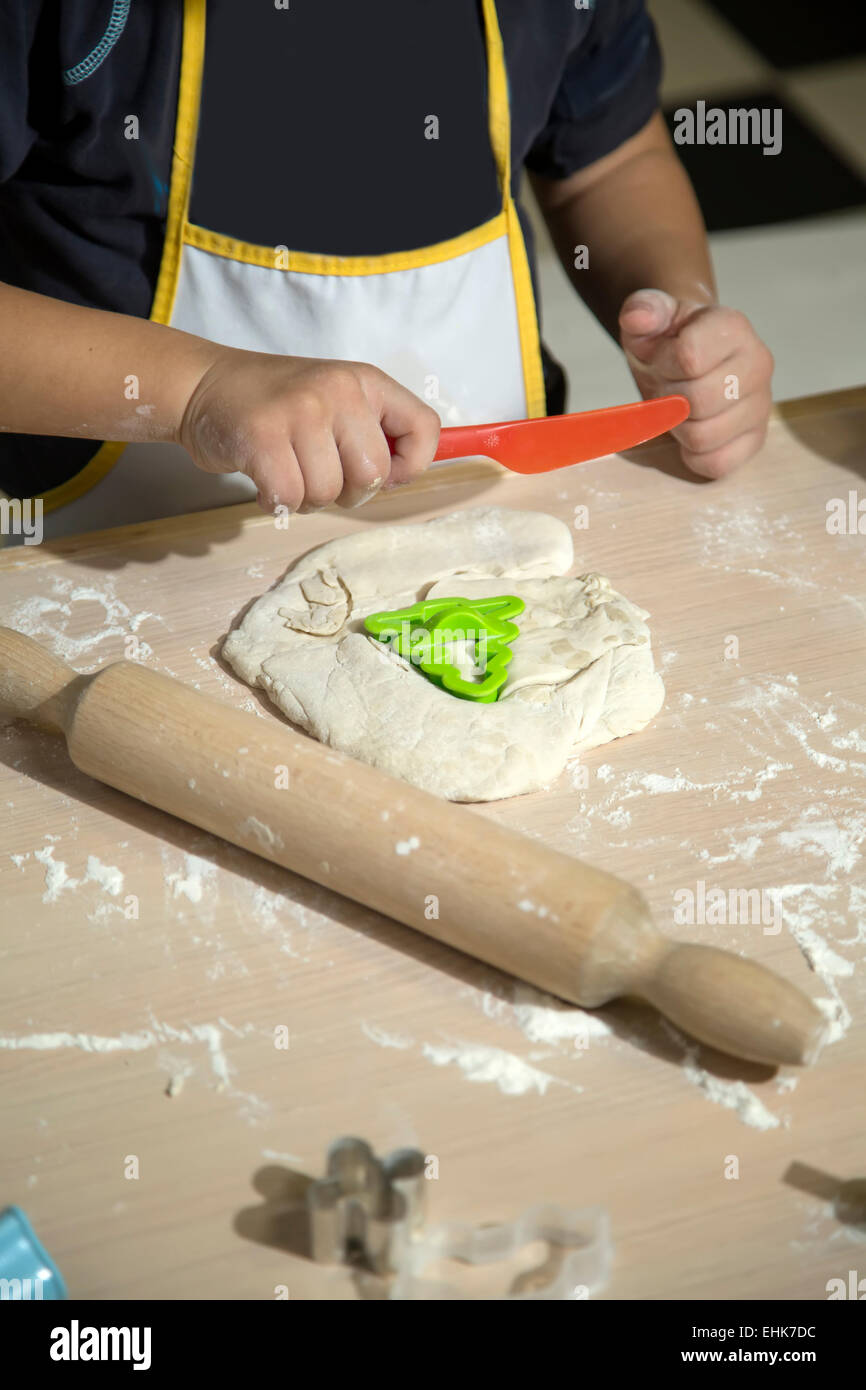 Boy making cakes in the kichen Stock Photo - Alamy