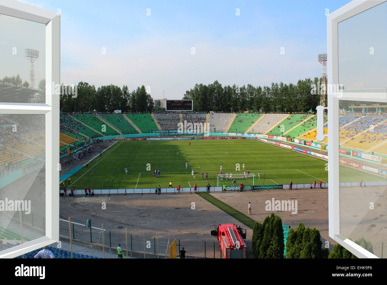 opened window to the stadium with football match Stock Photo - Alamy