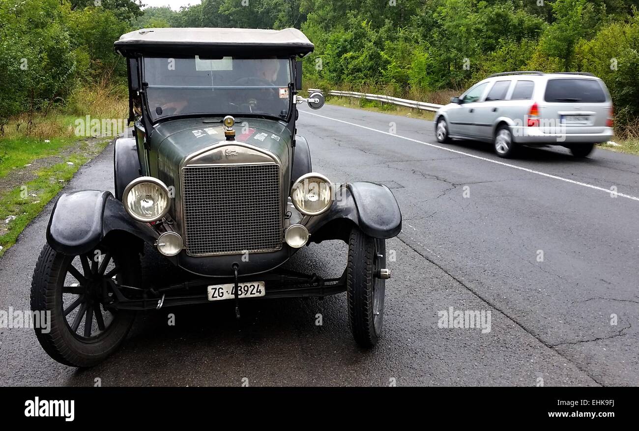 Former rally driver Bernhard Bragge taking a break with his Ford Model ...