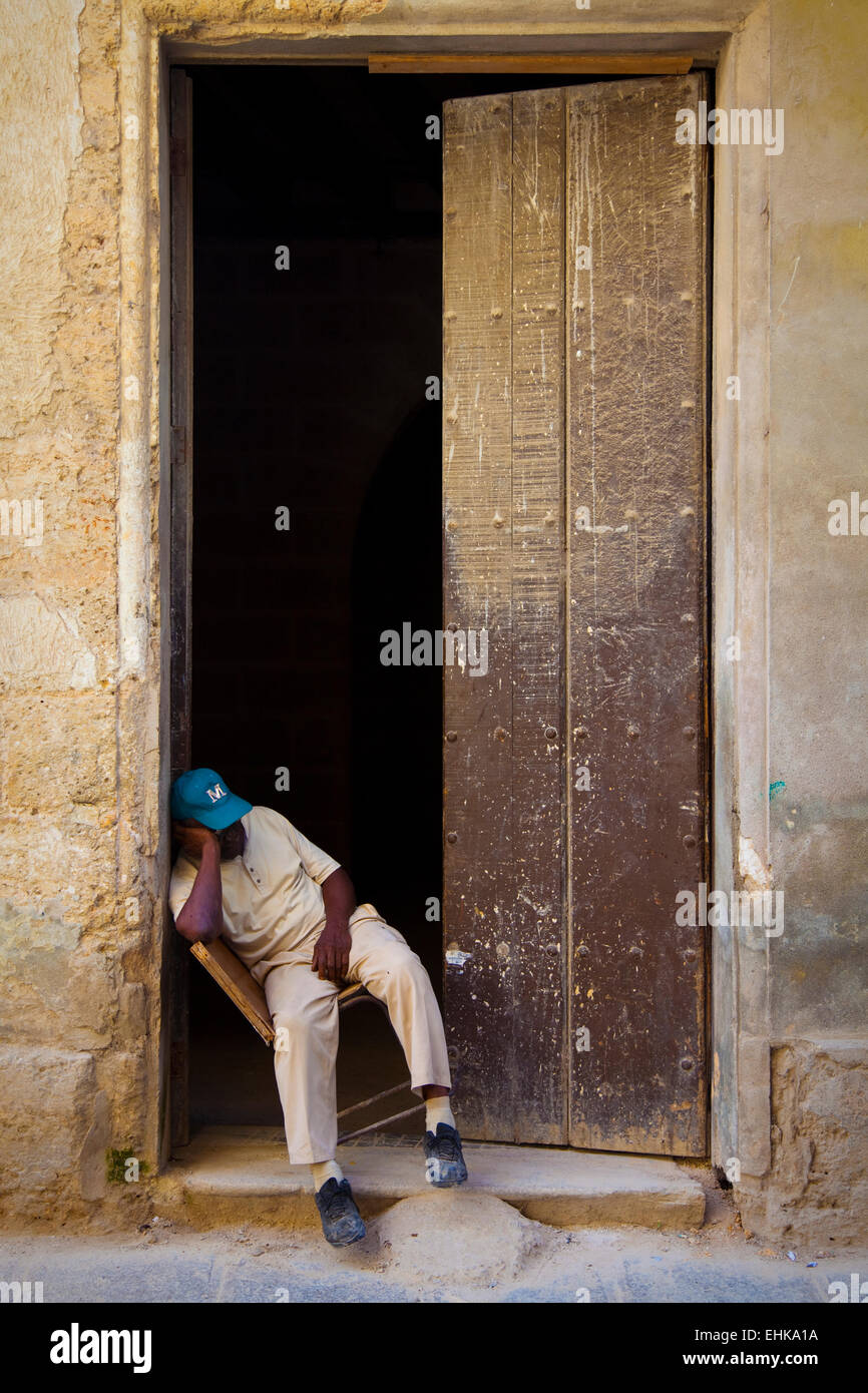 Security guard sleeping in chair hi-res stock photography and images ...