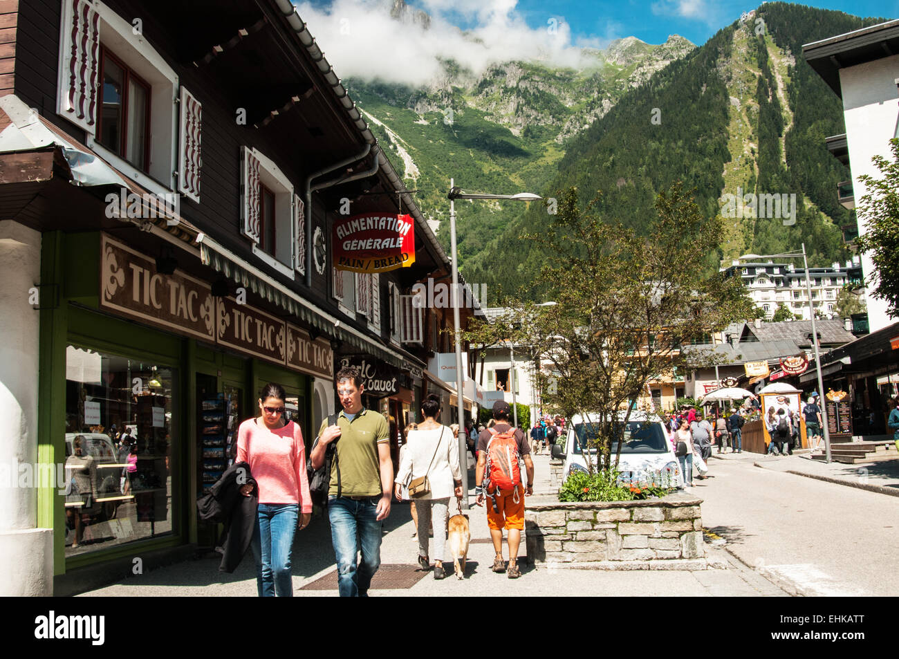 lovers walking up the main street, of Chamonix France, ray Boswell ...