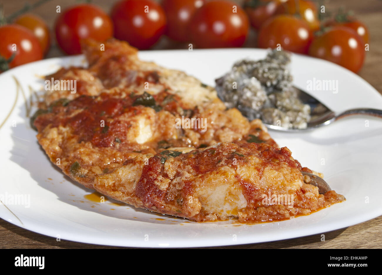 a traditional italian recipe: fillet of cod alla catanese a sicilian ...
