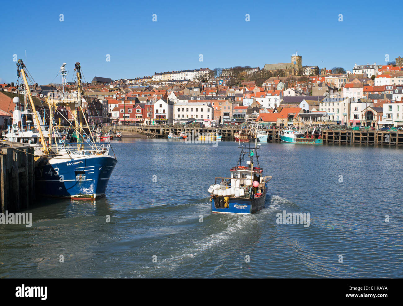 The fishing boat Cornucopia enters Scarborough harbour with the old ...