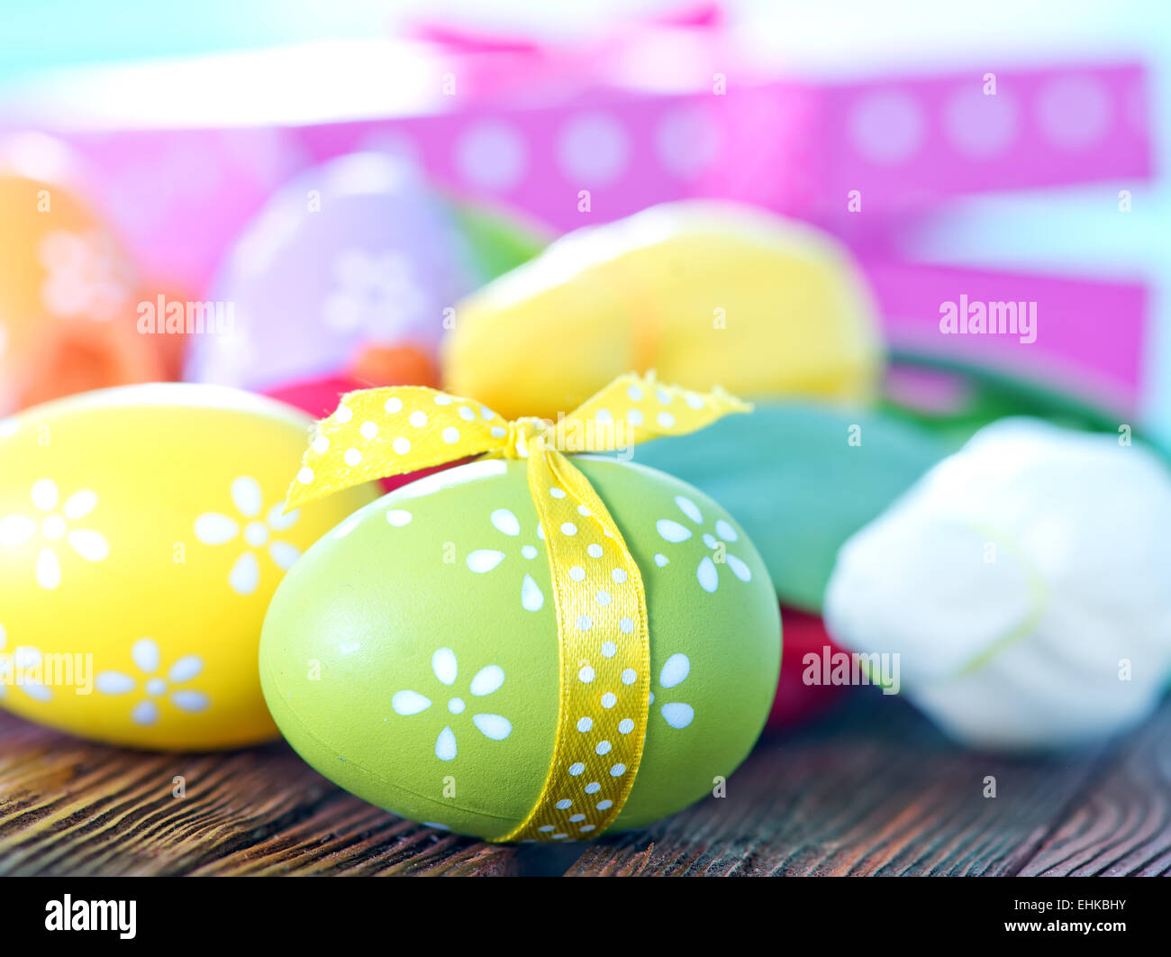 easter eggs and box for present on a table Stock Photo - Alamy