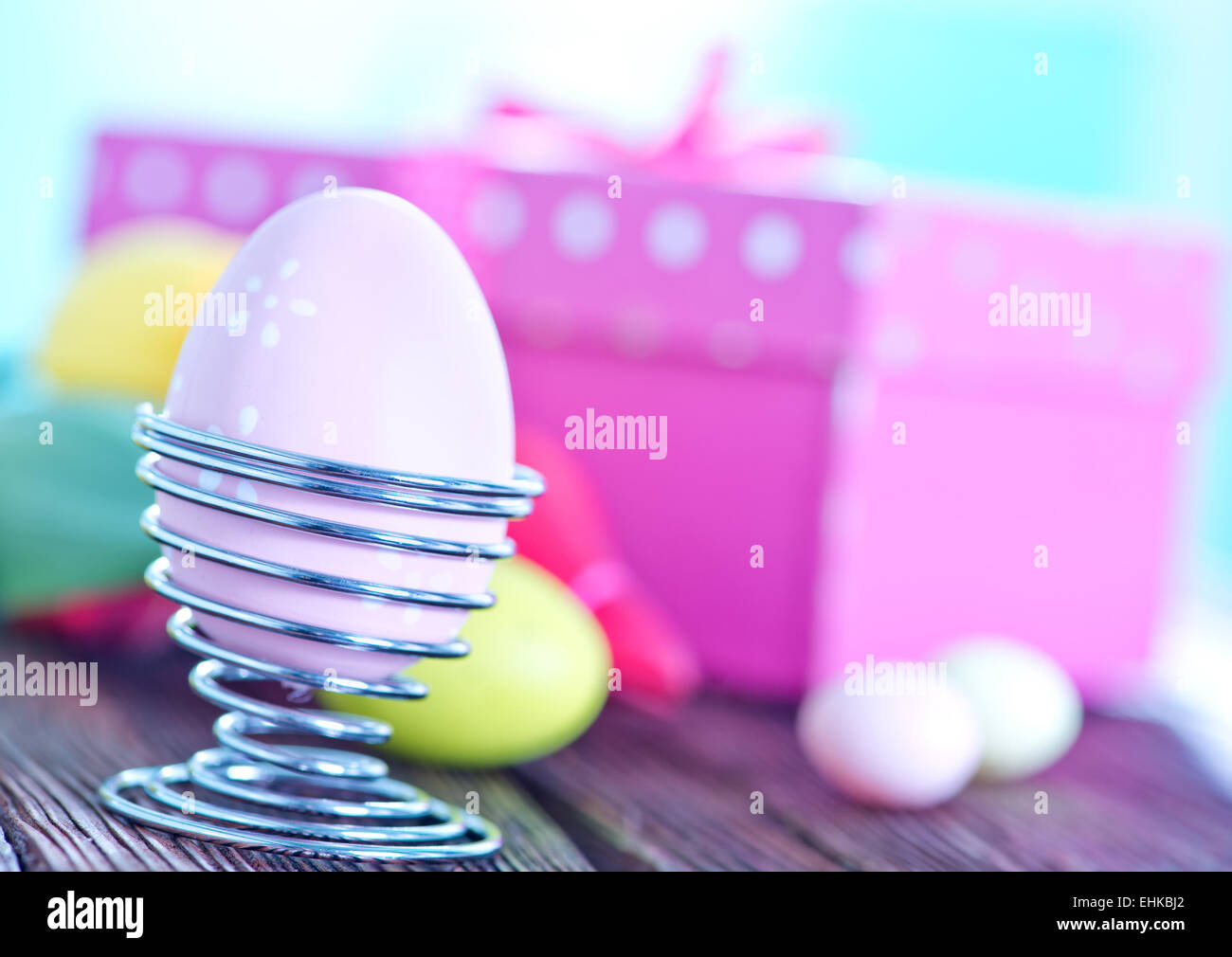 easter eggs and box for present on a table Stock Photo - Alamy