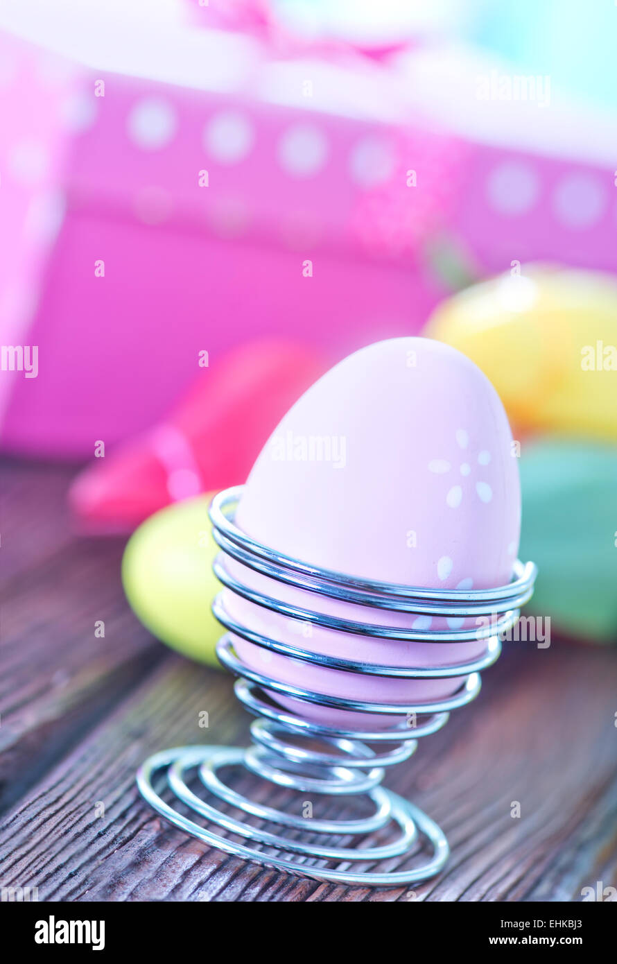 easter eggs and box for present on a table Stock Photo - Alamy