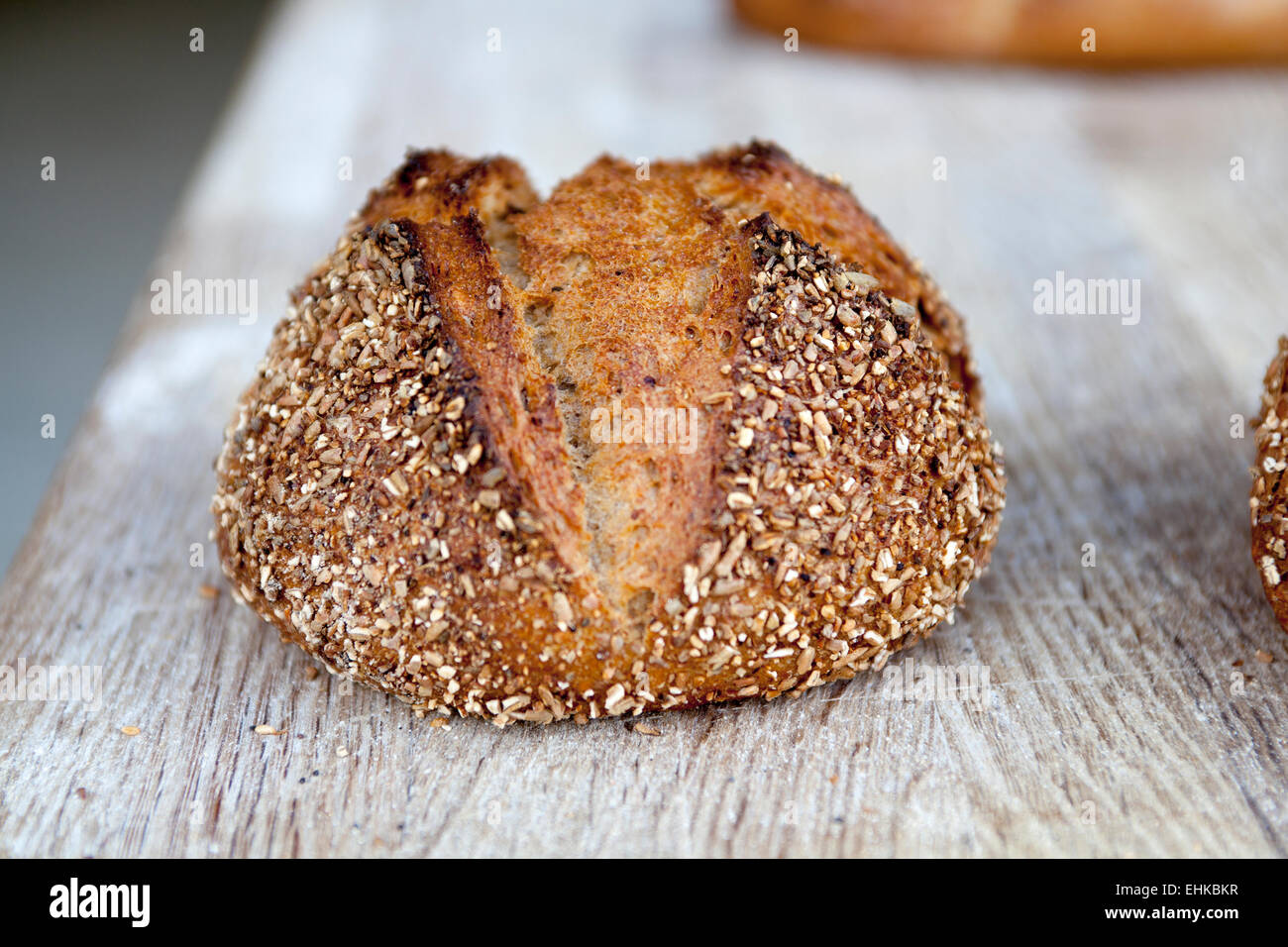 A round loaf of freshly baked wholemeal bread Stock Photo - Alamy