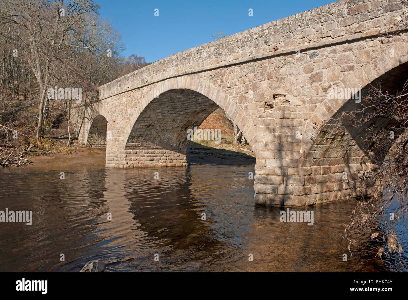 The three arch span Logie Bridge over the River Findhorn opened in 1817 ...