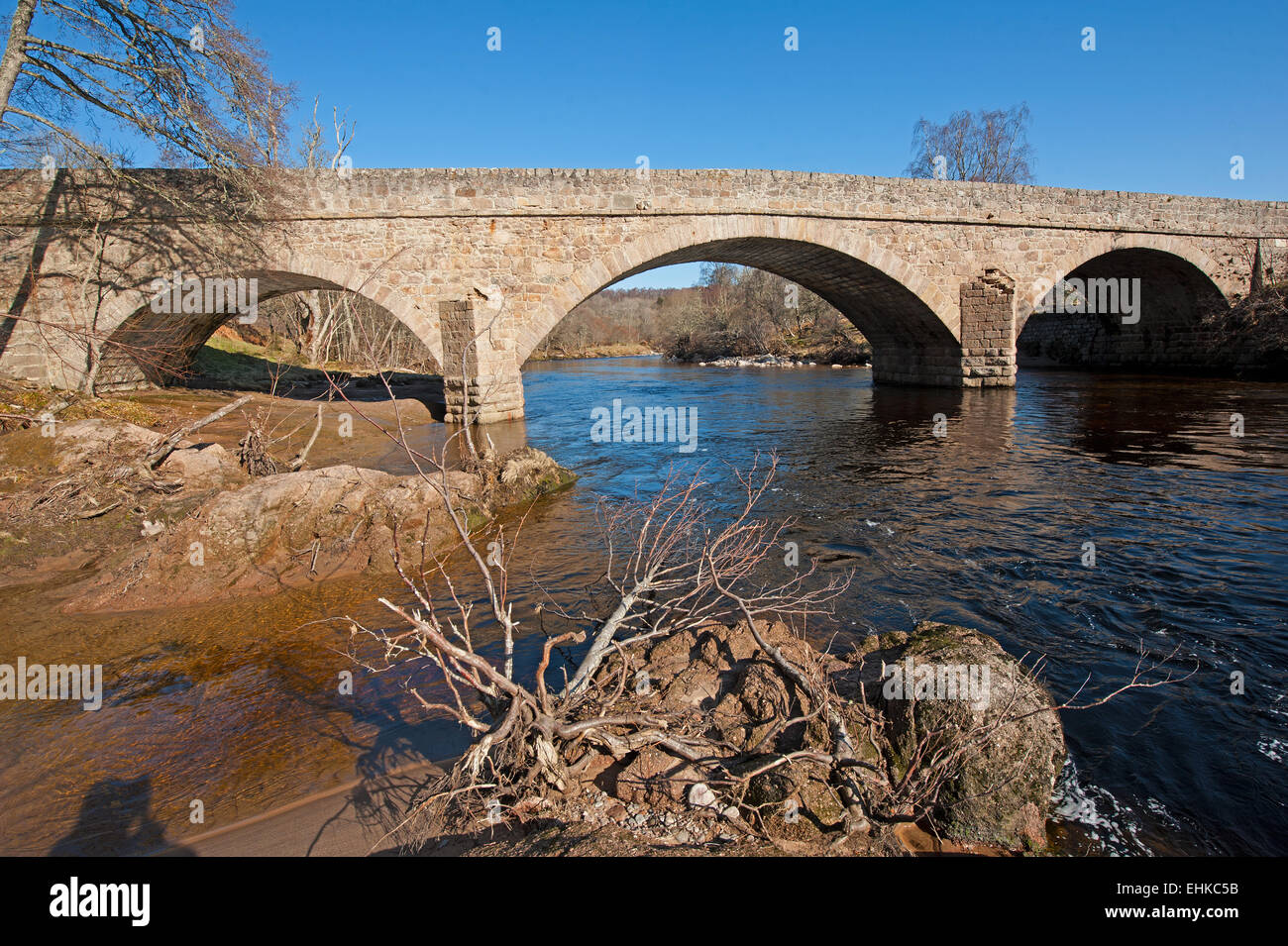 The three arch span Logie Bridge over the River Findhorn opened in 1817 ...