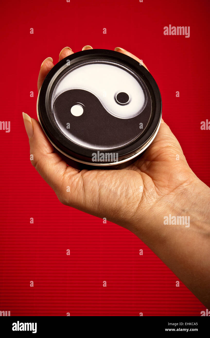 woman hands holding the yin yang symbol Stock Photo - Alamy
