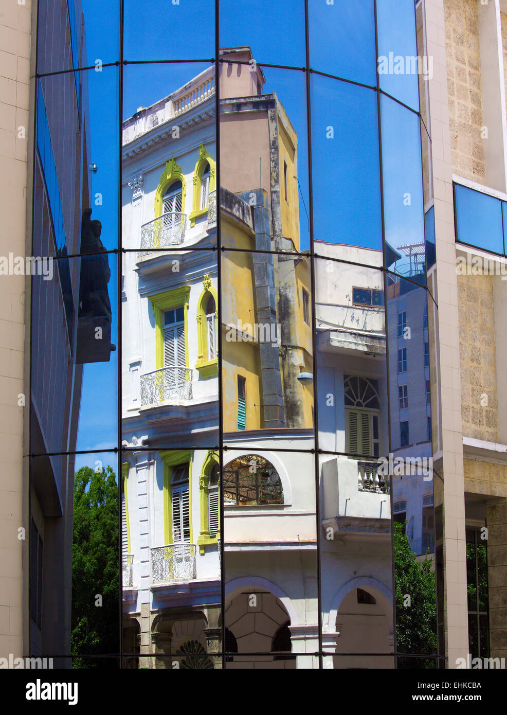 Old building mirrored in modern house window, Havana Stock Photo - Alamy