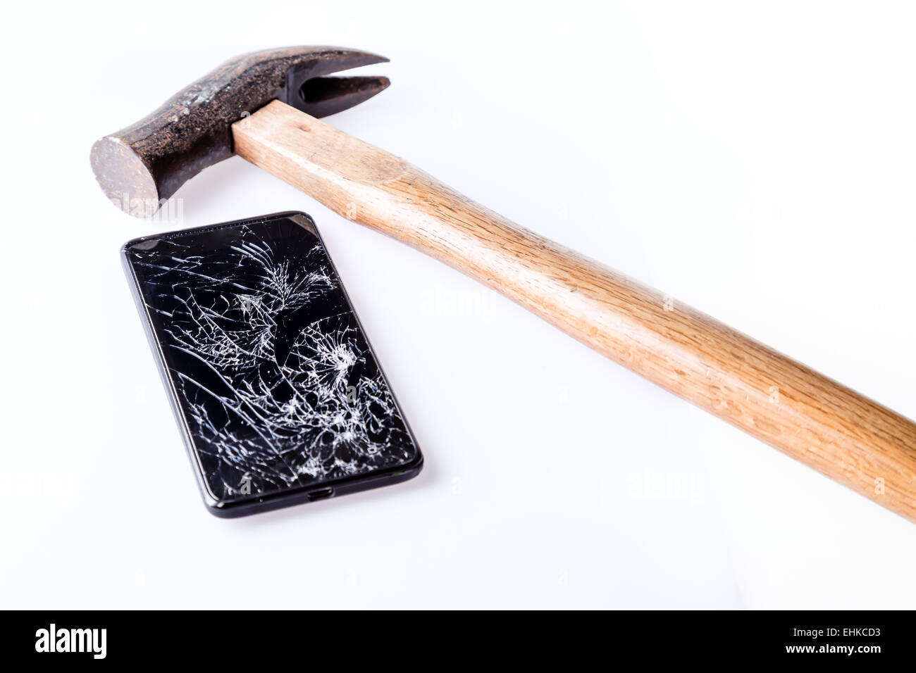 Hammer and smartphone with broken screen isolated on white Stock Photo ...