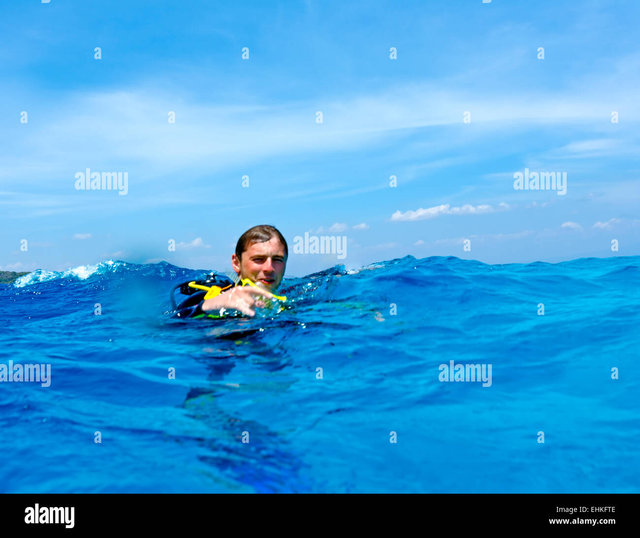 Young Man Diver after Deep Dive Resting in Ocean Stock Photo - Alamy