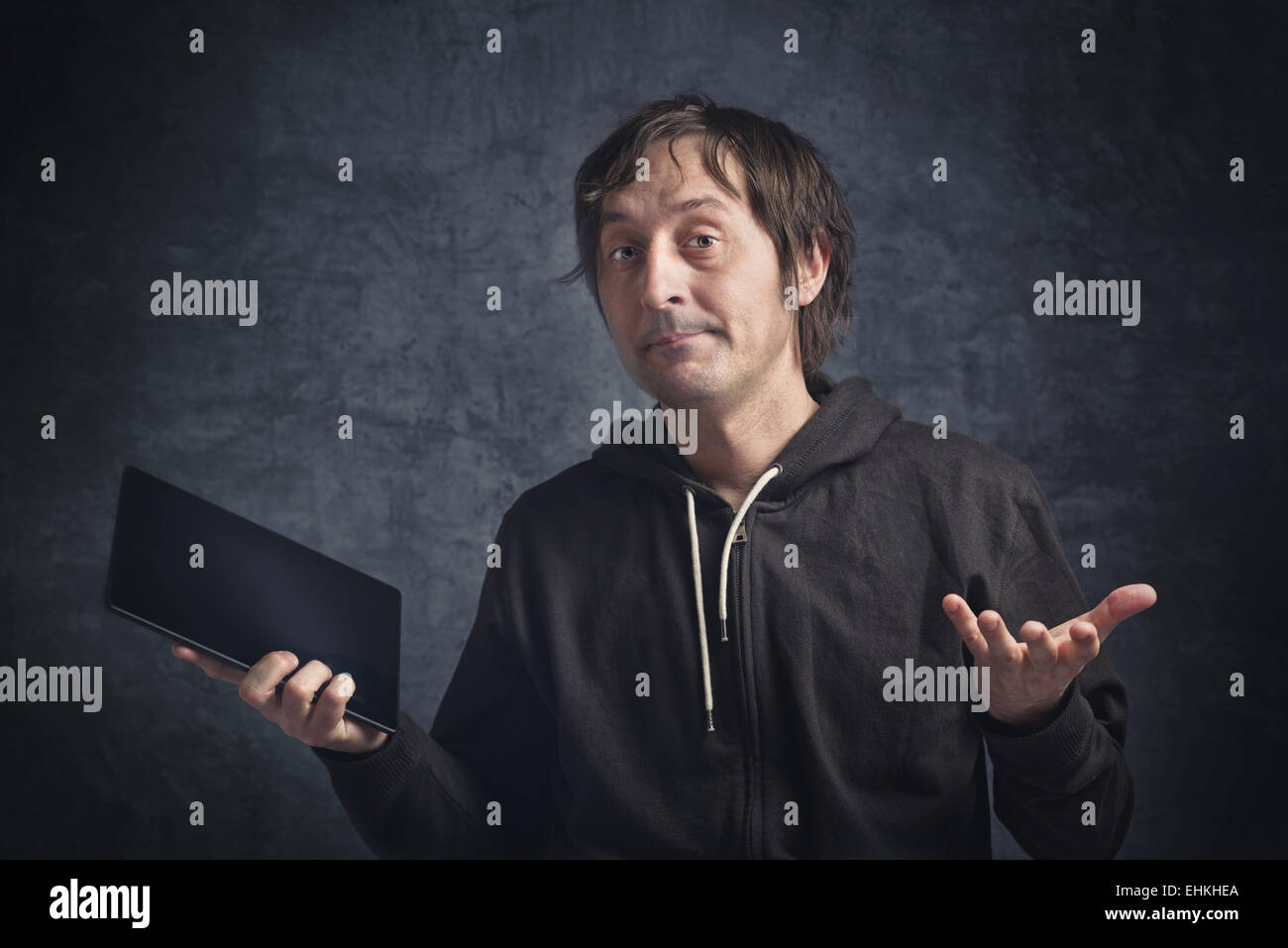 Digital Tablet Computer Noob, Adult Caucasian Man is a Newbie in using ...