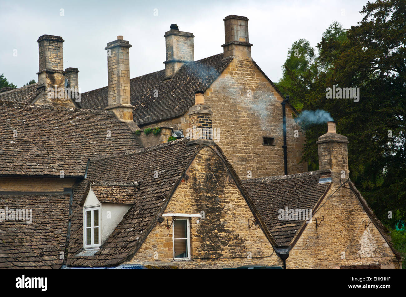 Chimneys and rooftops of houses in the Cotswolds, England, United ...