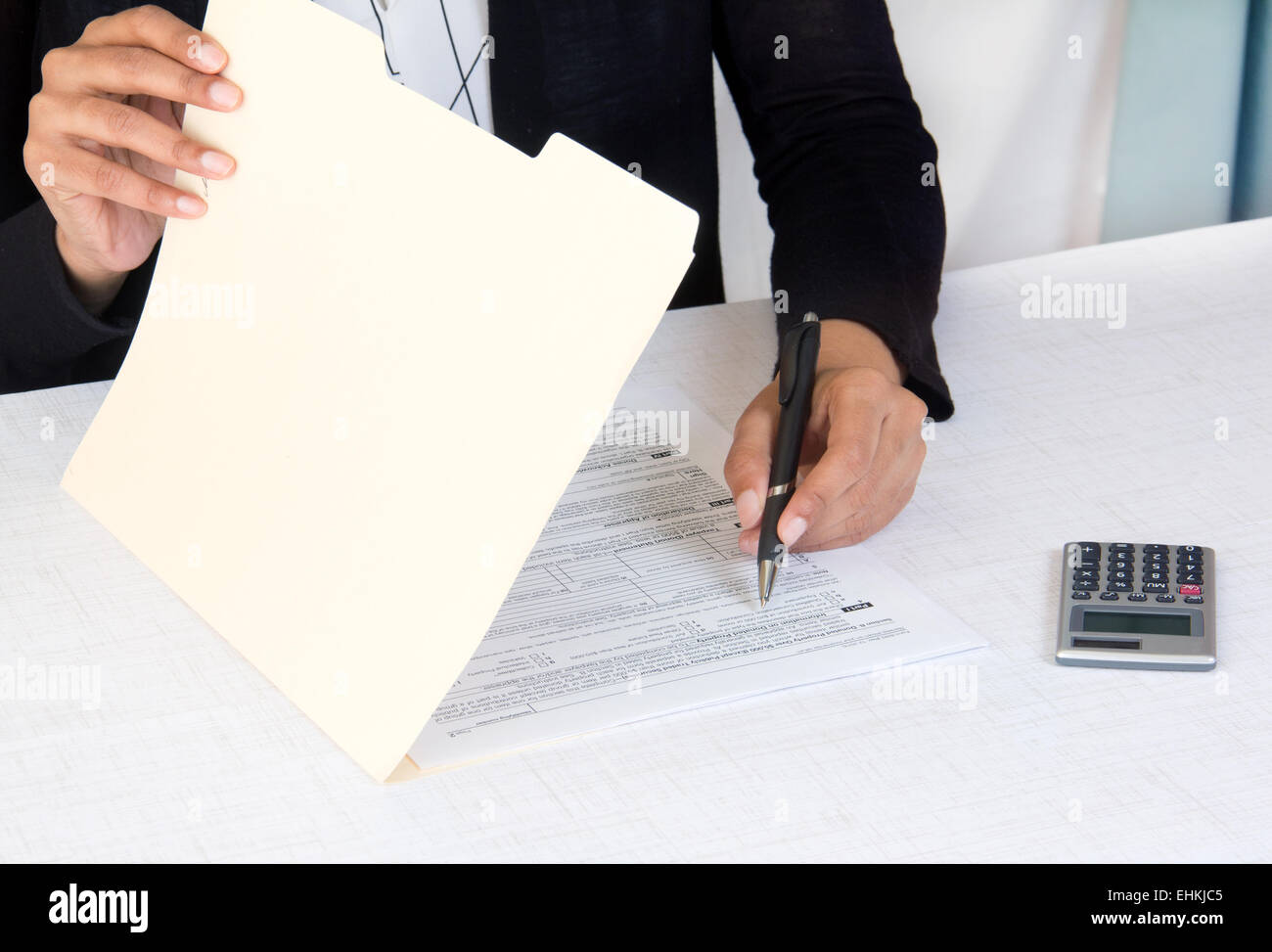 Corporate employee working of company accounts Stock Photo - Alamy