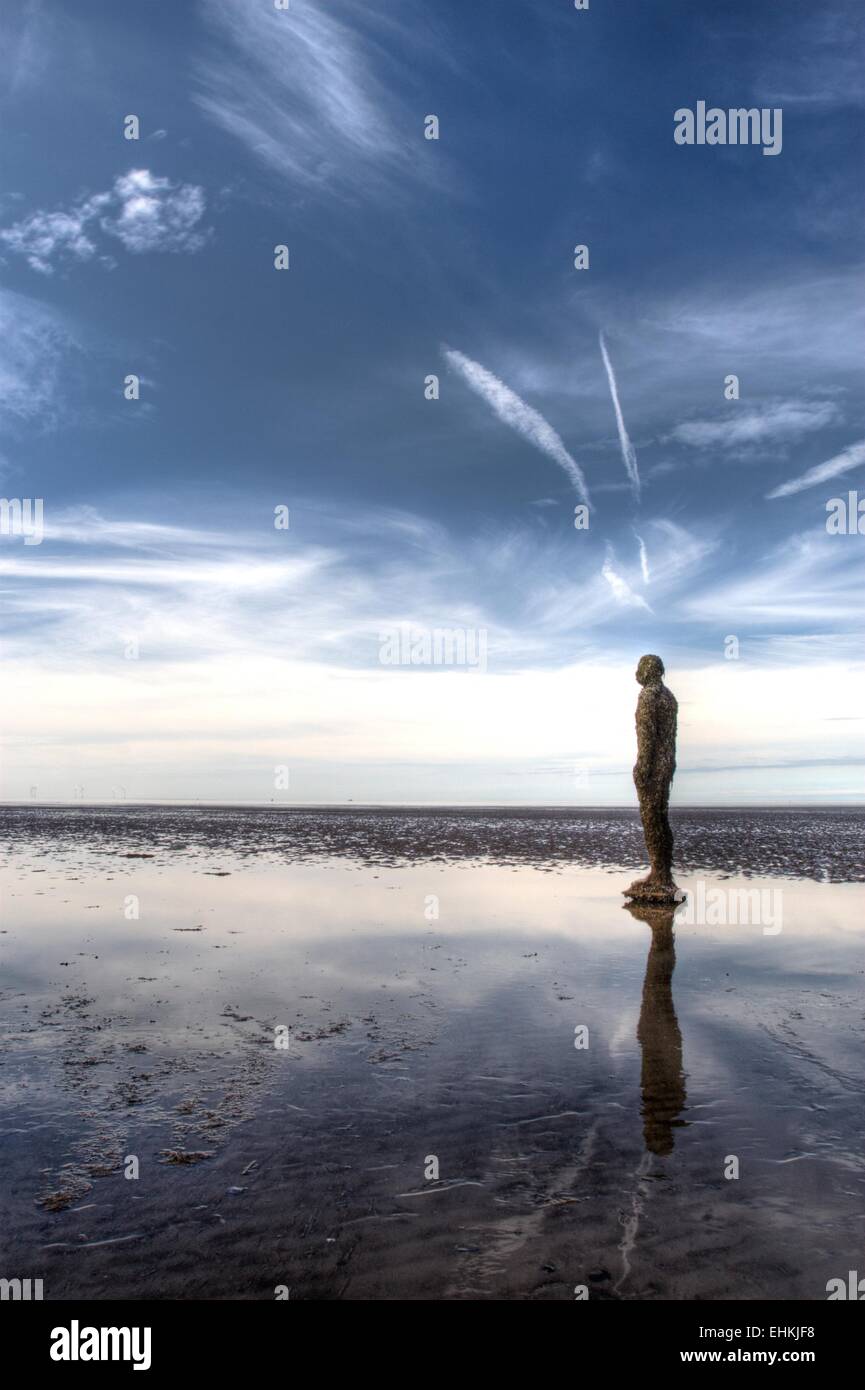 Another Place statue by Anthony Gormley, Liverpool, UK Stock Photo - Alamy